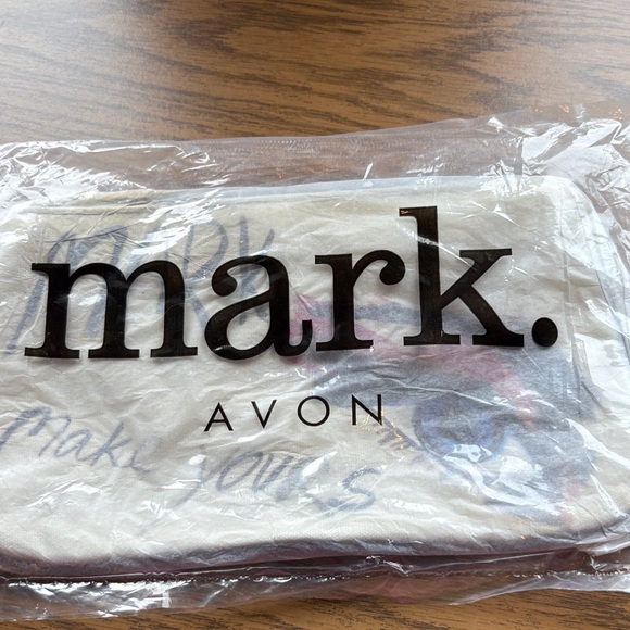 Avon | Bags | Avon Mark Cream And Black Cosmetic Pouch | Poshmark